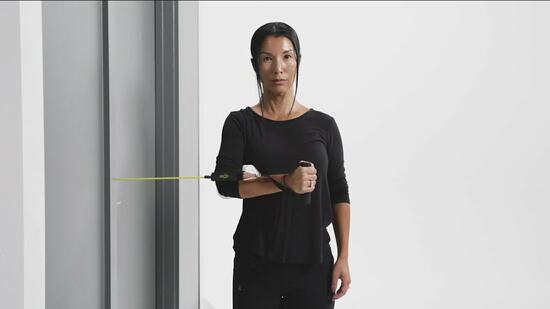 Standing Shoulder Inward Rotation With a Resistance Band : OrthoPedia ...
