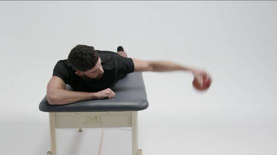 Lying Face-Down Shoulder Ball Drop With Your Arm and Elbow Elevated and ...